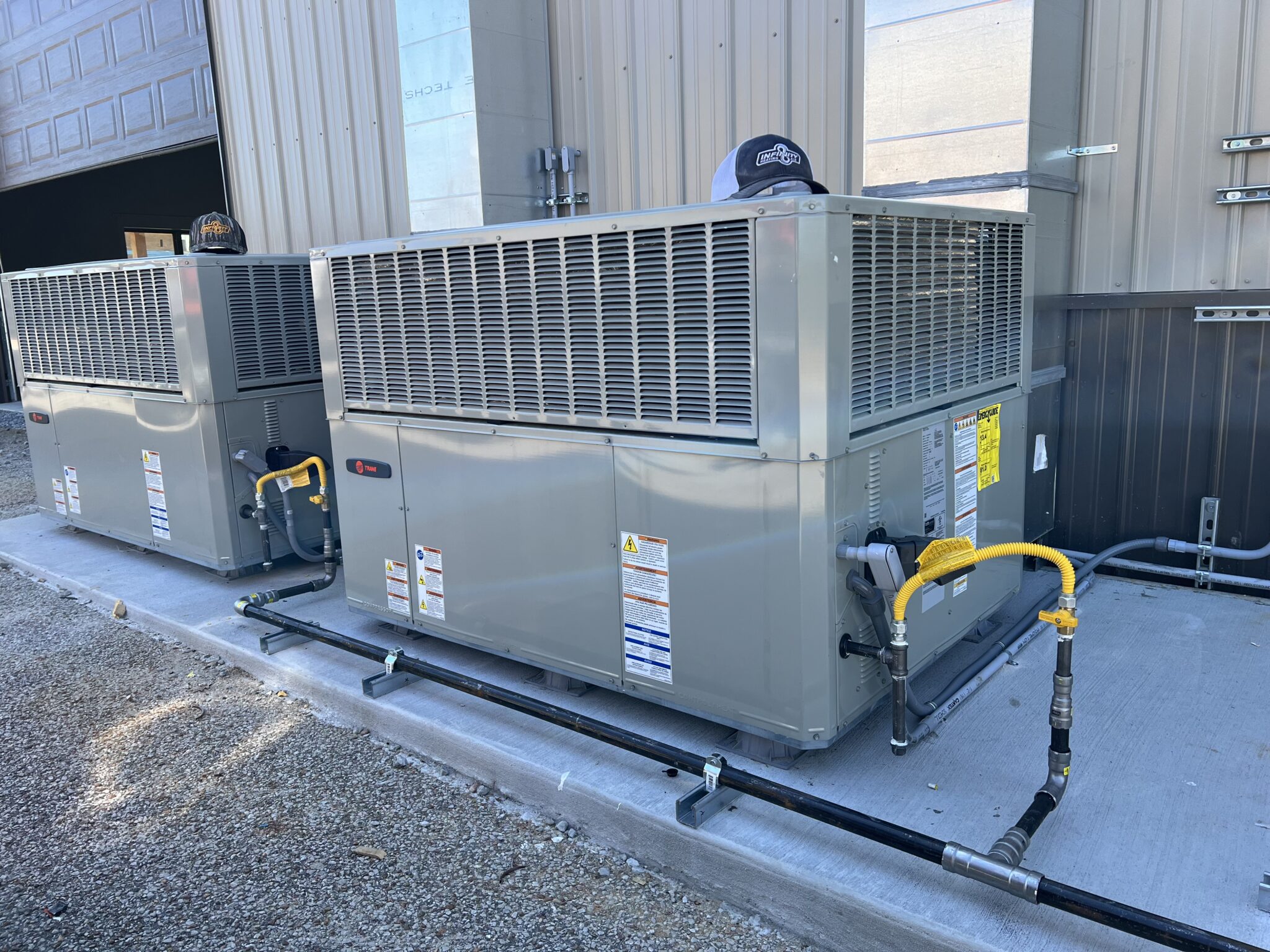 Installation of two new Trane package units - Infinity Heating and Air ...